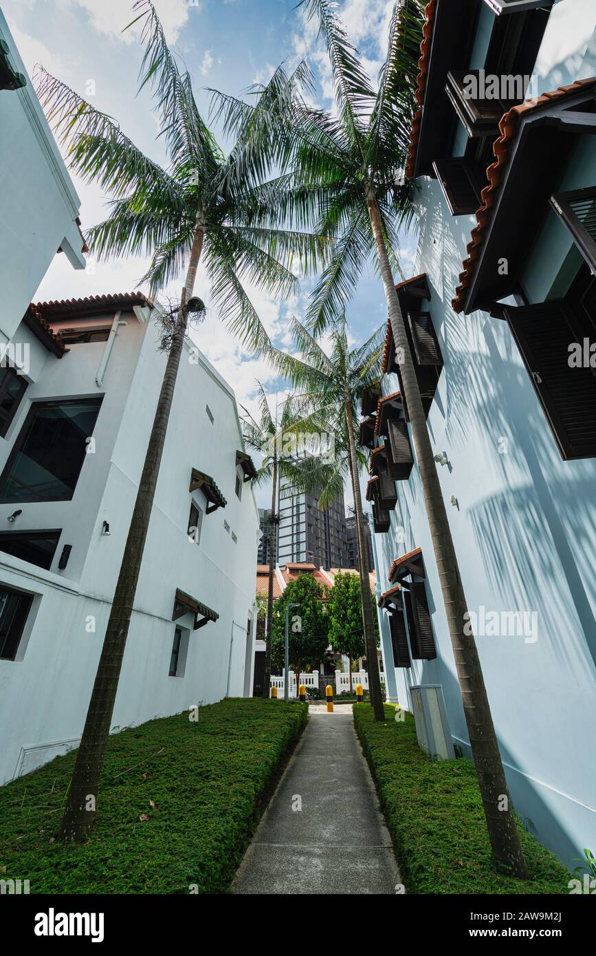 Singapore. January 2020. A narrow passage between the houses Stock ...