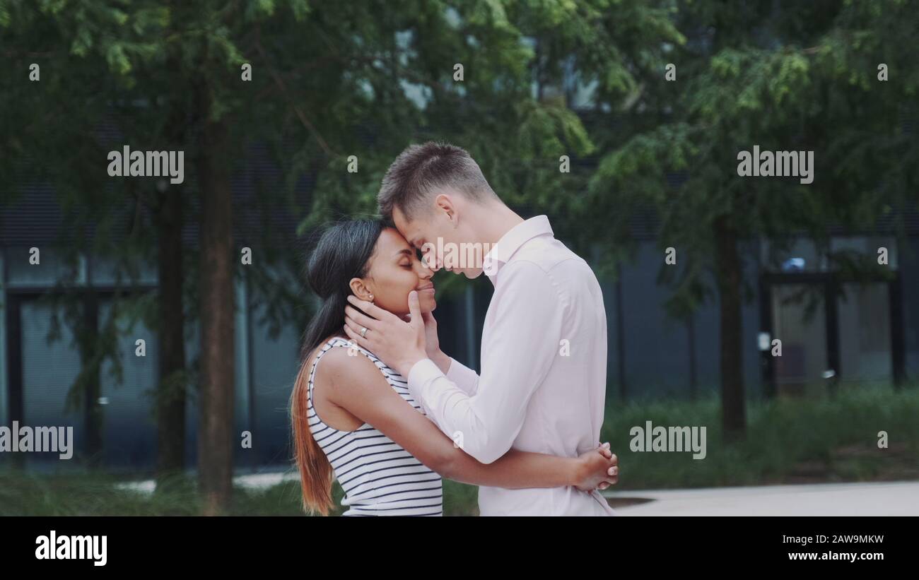 African couple putting foreheads together hi-res stock photography and ...