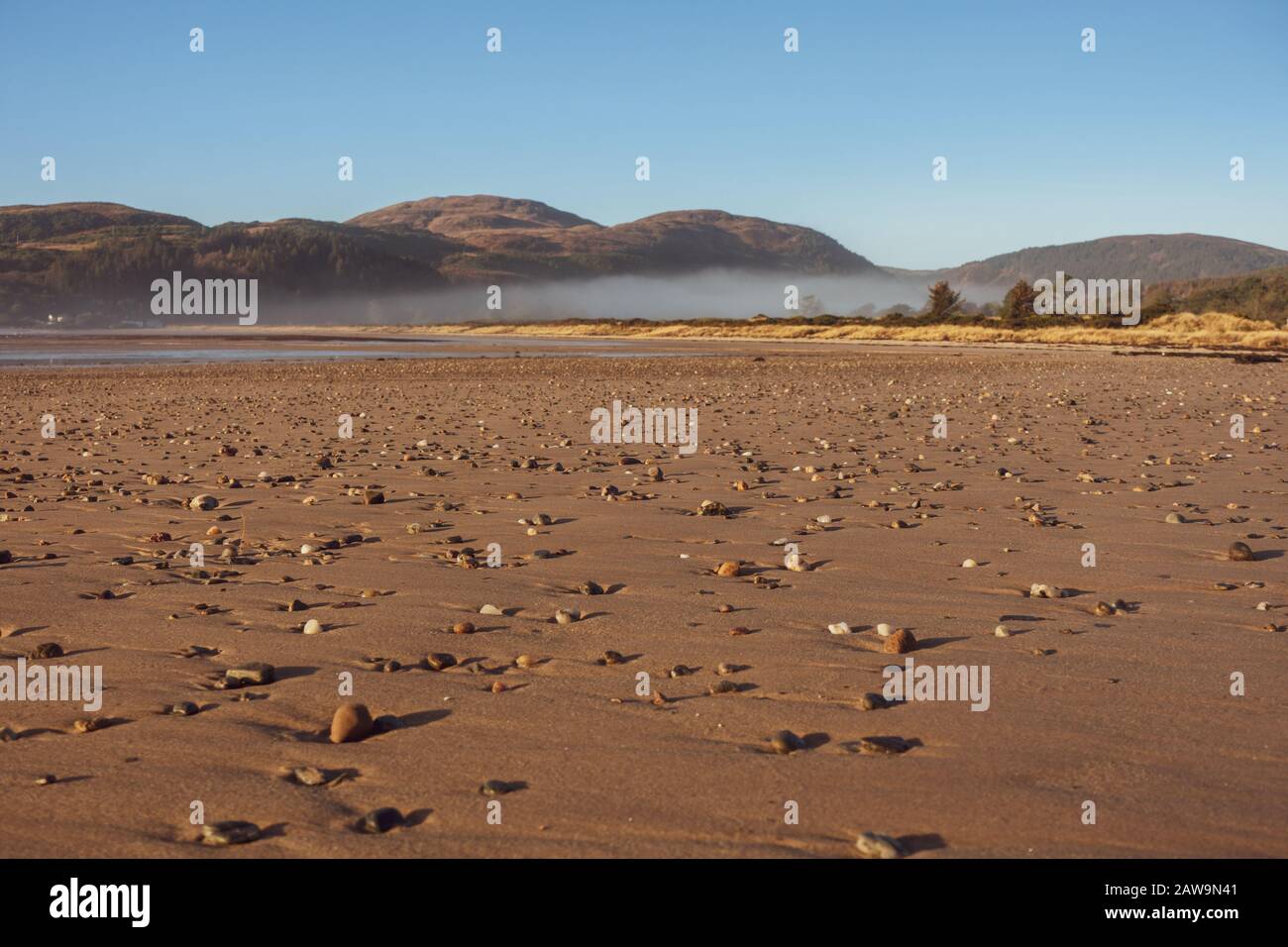 Stunning view from Carradale Bay with mountains behind and mist hanging ...
