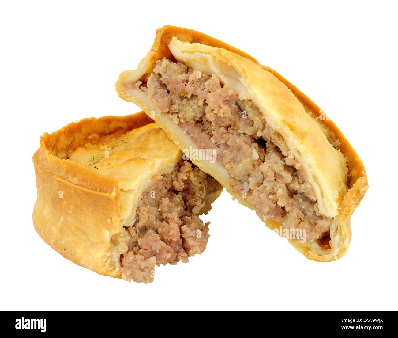 Traditional Scotch meat pie with hard crusty pastry isolated on a white ...