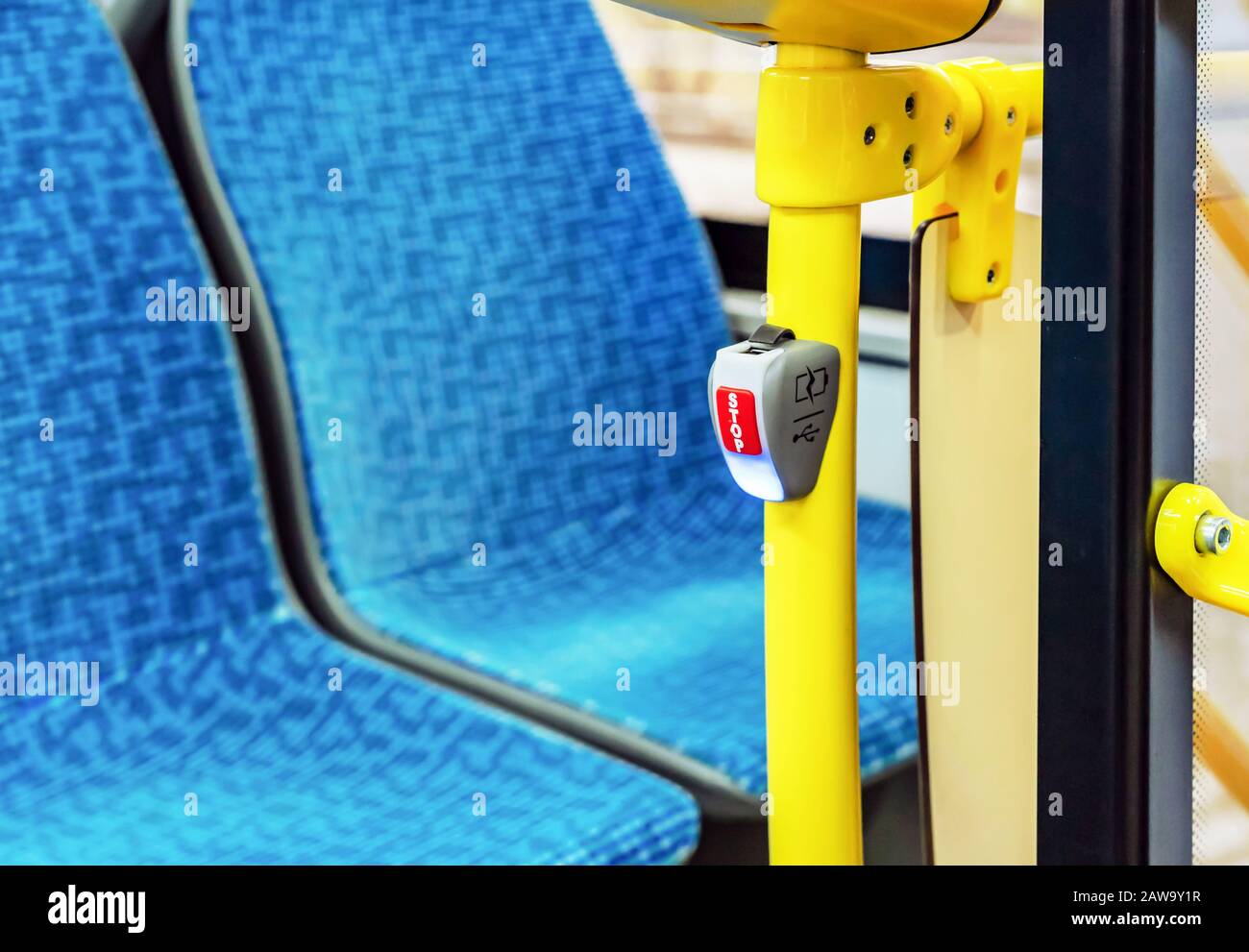 Red stop button in public transport. Bus stop button at the request of ...