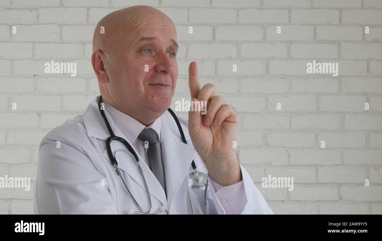Confident Doctor Smiling and Warning Pointing with Finger Making ...