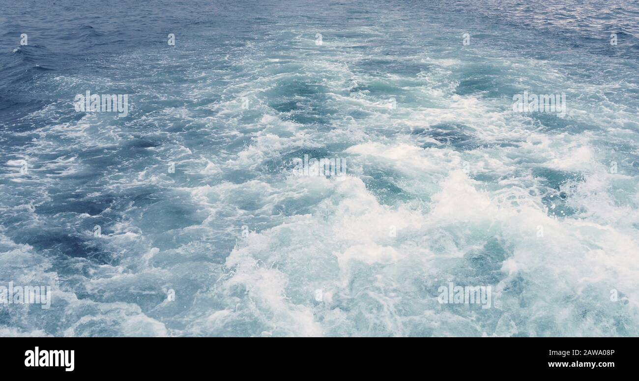 Water with boat trace. Water foam trace behind the ship Stock Photo - Alamy