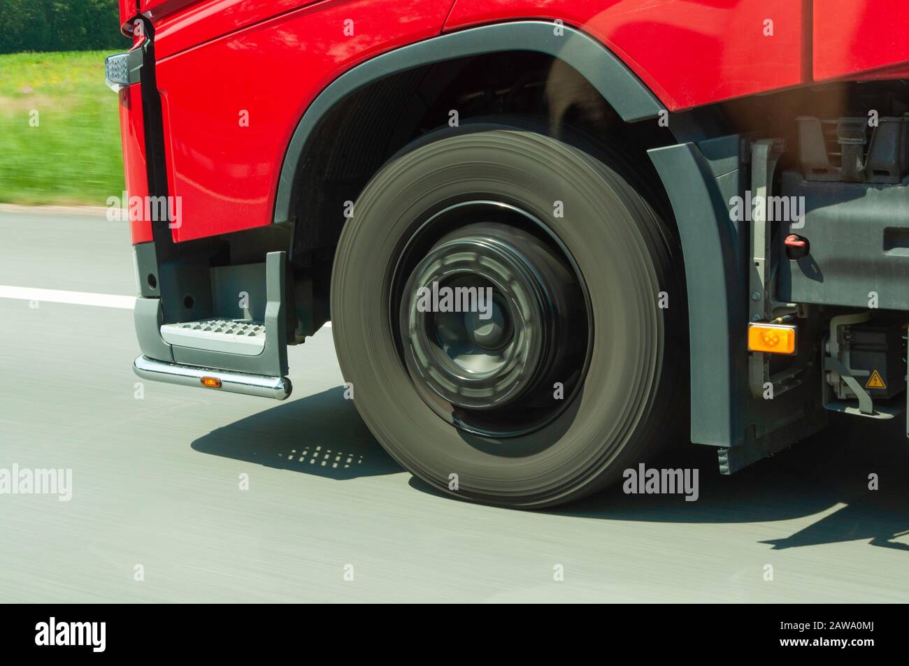 motion wheel on red cabin truck Stock Photo - Alamy