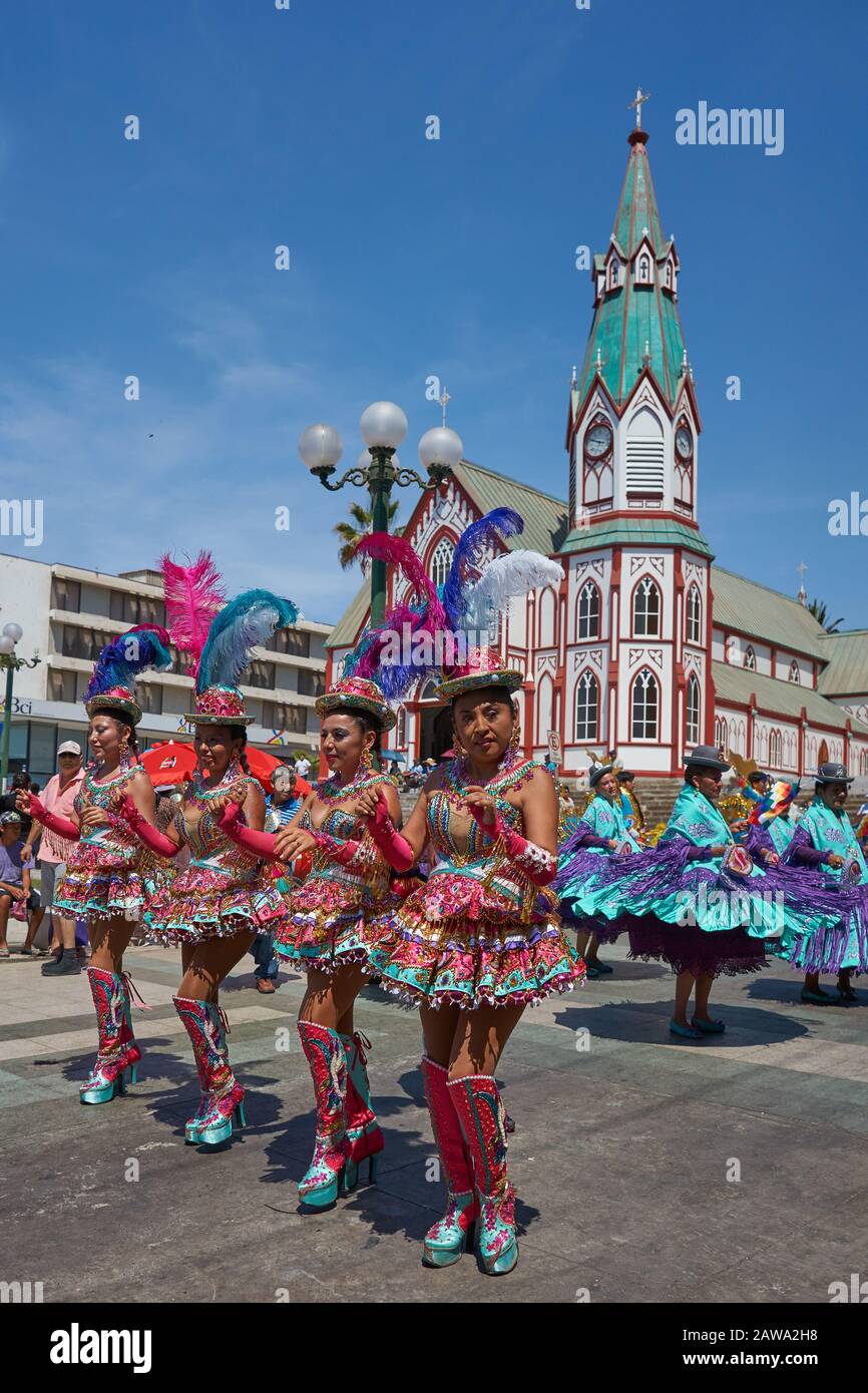 Morenada Dance Group performing during a street parade at the annual ...