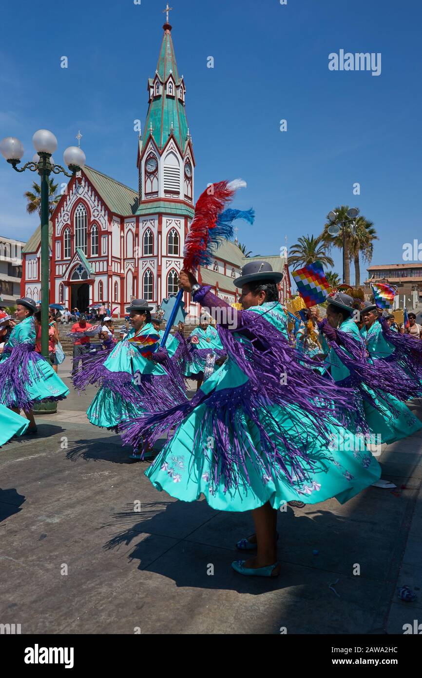 Morenada Dance Group performing during a street parade at the annual ...