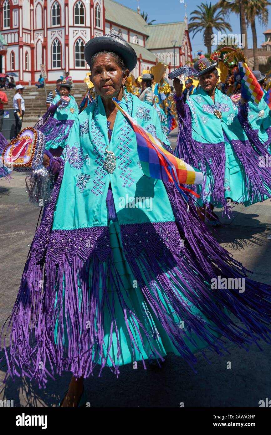 Morenada Dance Group performing during a street parade at the annual ...