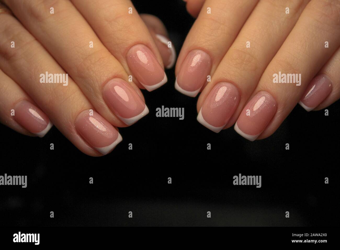 The refined beautiful female fingers Stock Photo - Alamy