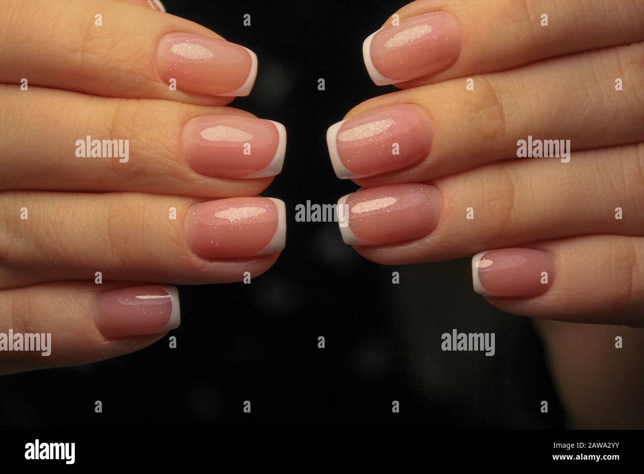 The refined beautiful female fingers Stock Photo - Alamy