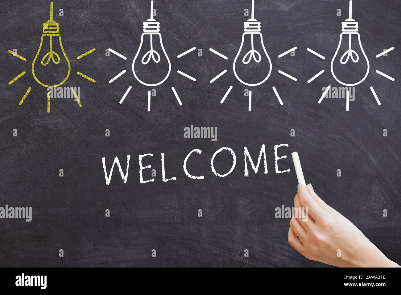 Lightbulbs word Welcome on a chalk board Stock Photo - Alamy