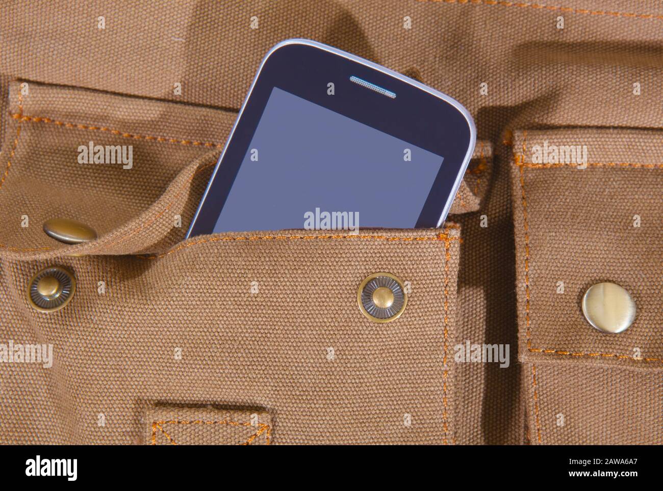 smartphone in open pocket of fabric bag Stock Photo - Alamy