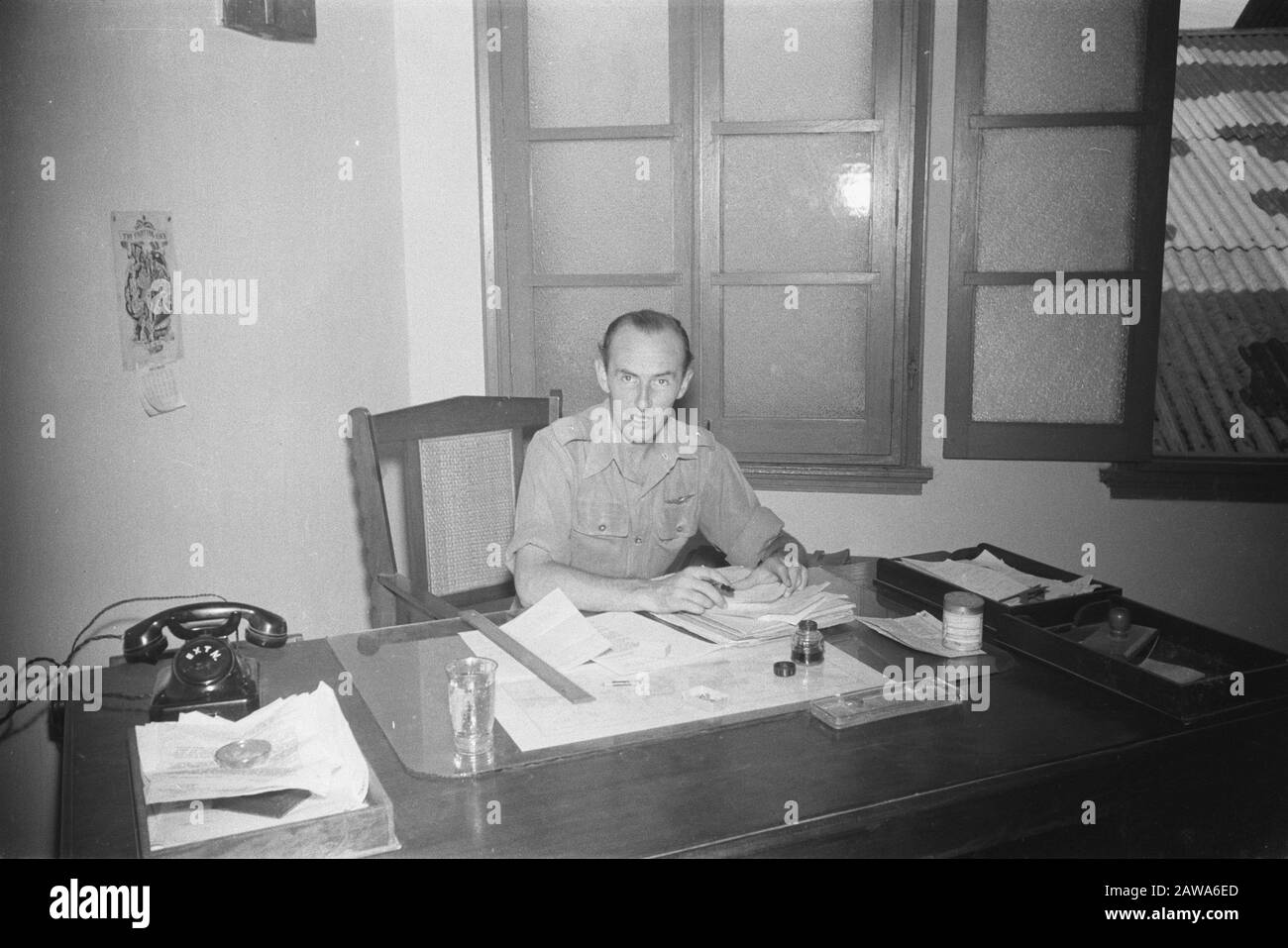 Service Welfare Lieutenant behind a desk in the office of Service ...
