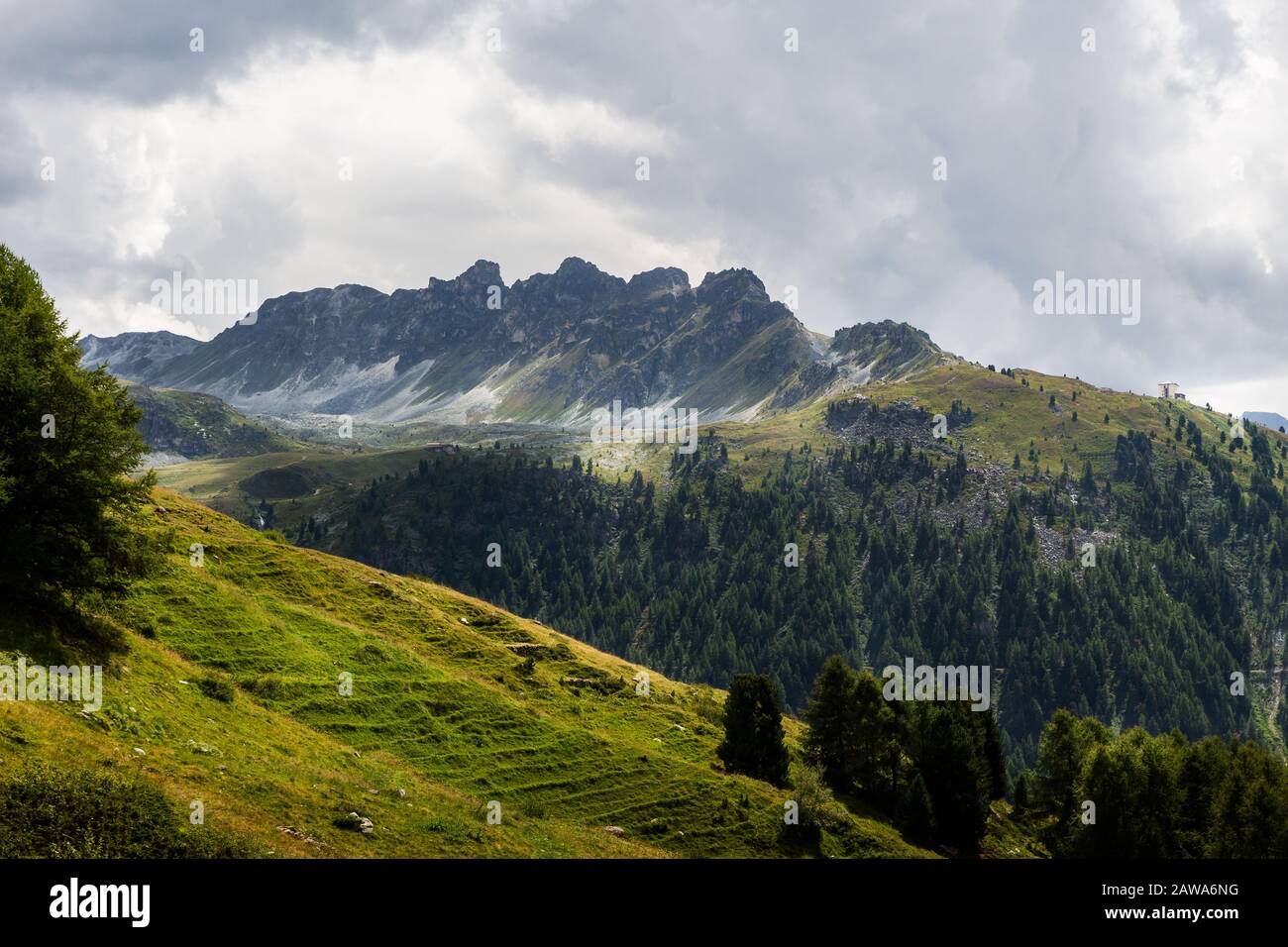 Spectacular wide mountain landscape in the Swiss Alps under dramatic ...