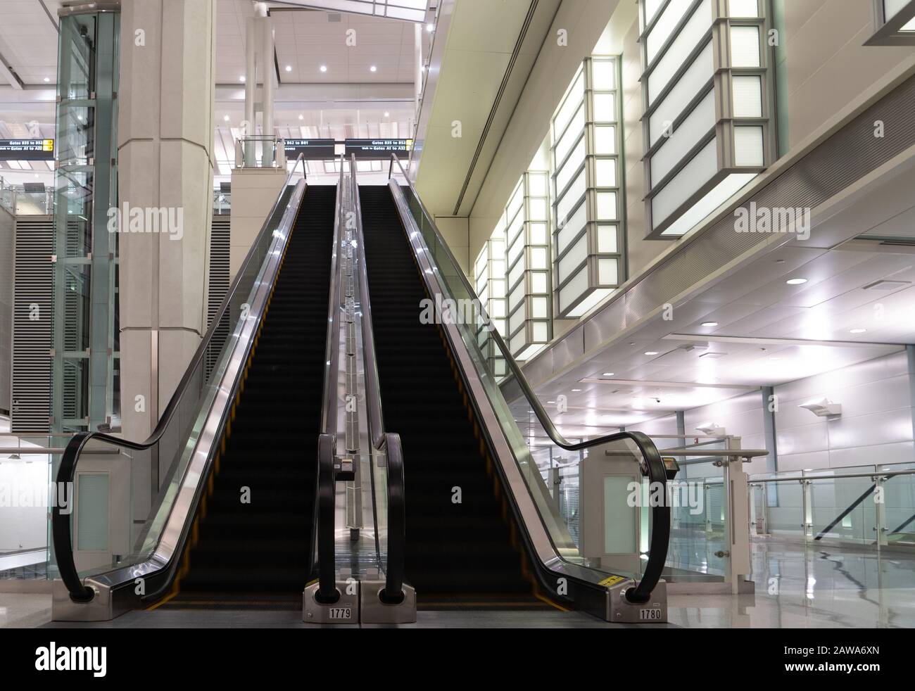 Double elevator going downward in Terminal B of Dulles Airport ...