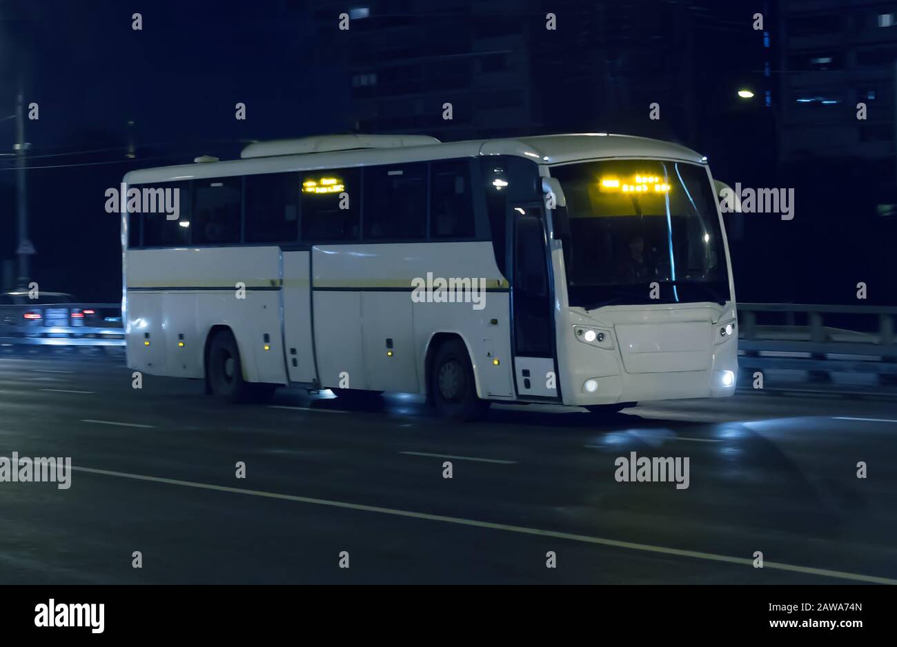 bus moves on city street at night Stock Photo - Alamy