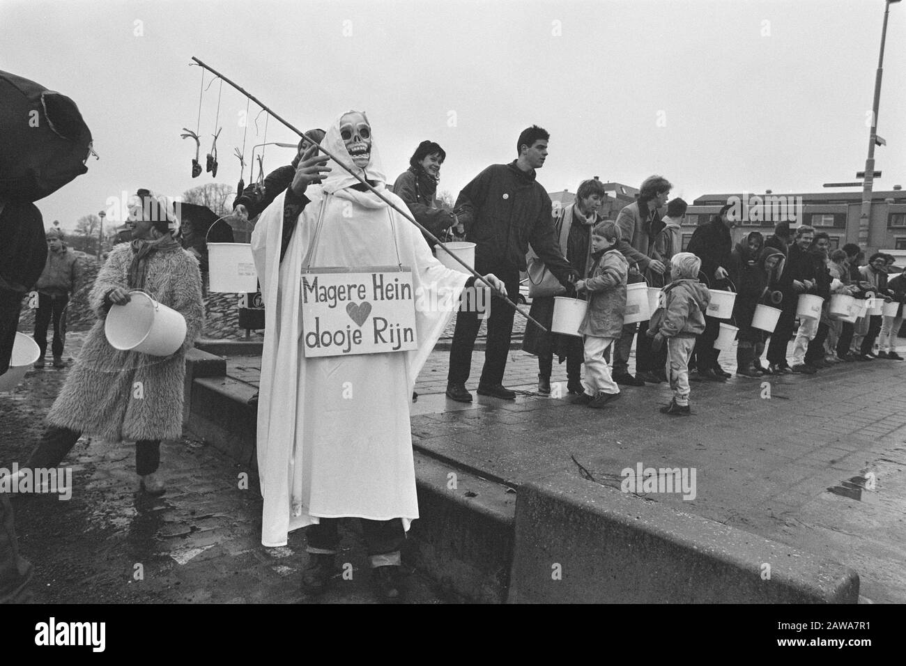 Grim Reaper with pole dead fish Waal Bank in Nijmegen on day of action ...