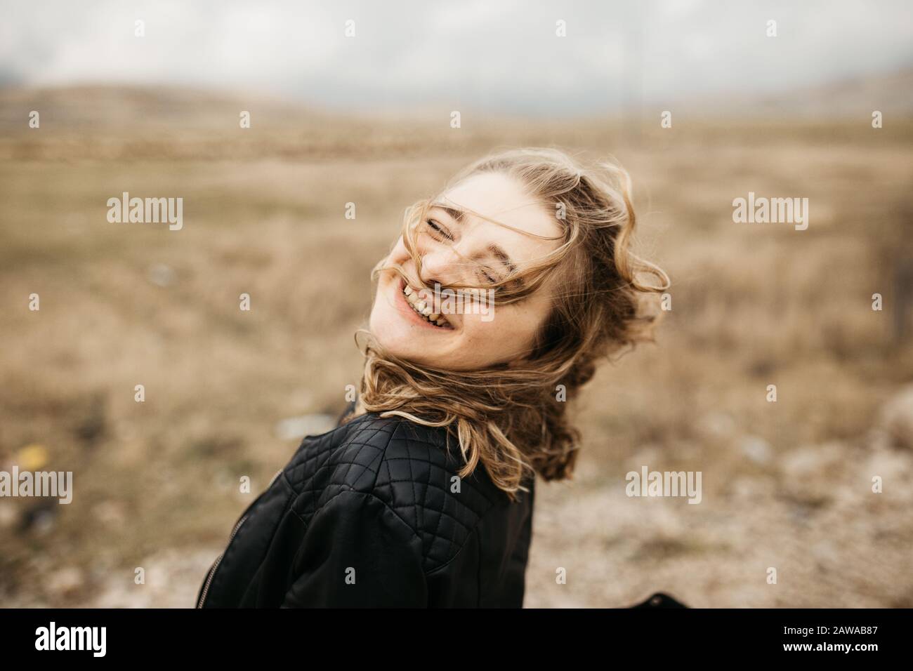 Strong wind blowing woman hi-res stock photography and images - Alamy