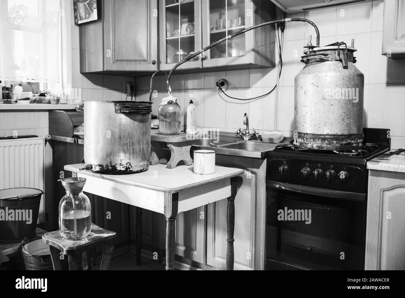 Old-fashioned moonshine machine for creating homemade strong alcohol in ...