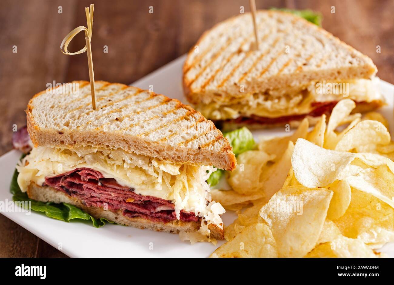 Classic Reuben Sandwich with Potato Chips Stock Photo - Alamy