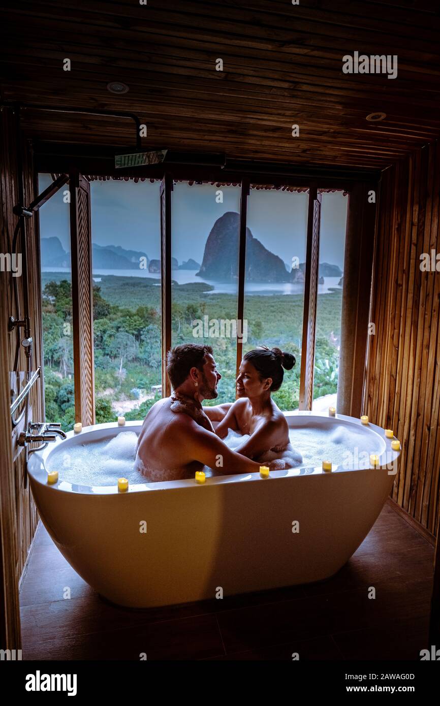 Couple by bathtub hi res stock photography and images Alamy
