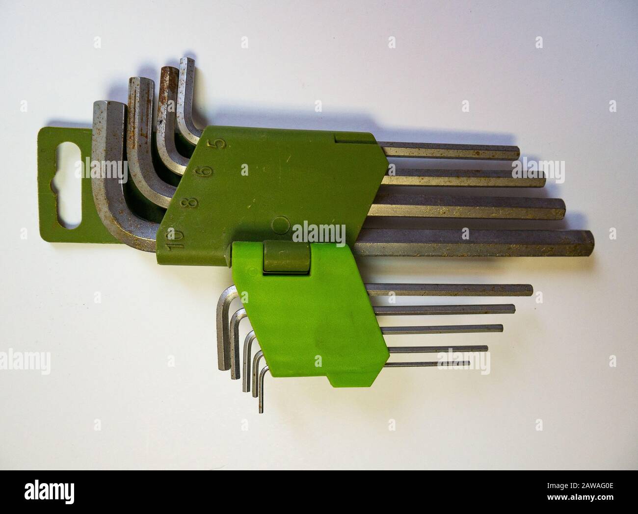 Hexagonal key on a white background Stock Photo - Alamy