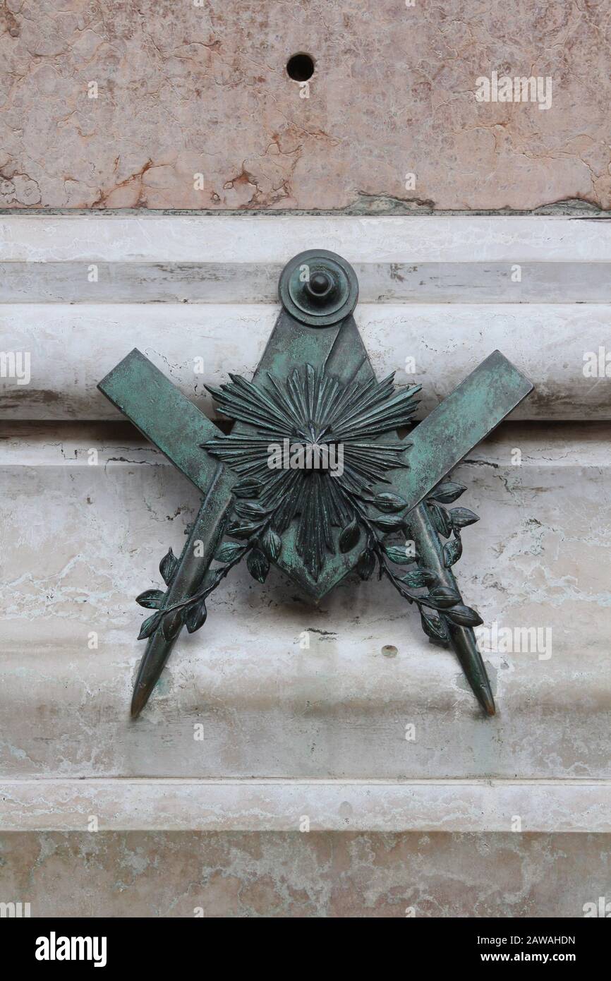 Freemasonry bronze symbol in Bologna, Italy, part of Ugo Bassi monument ...