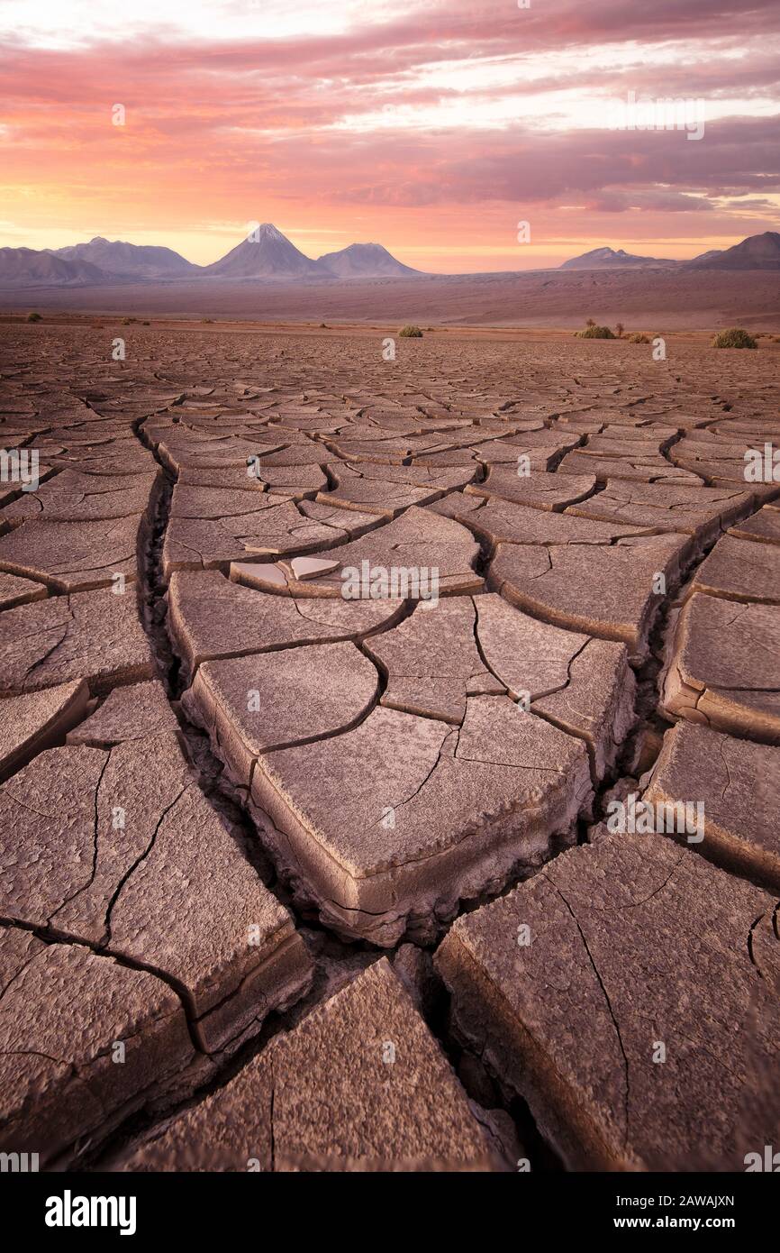 desert cracks and volcanoes in atacama desert Stock Photo - Alamy