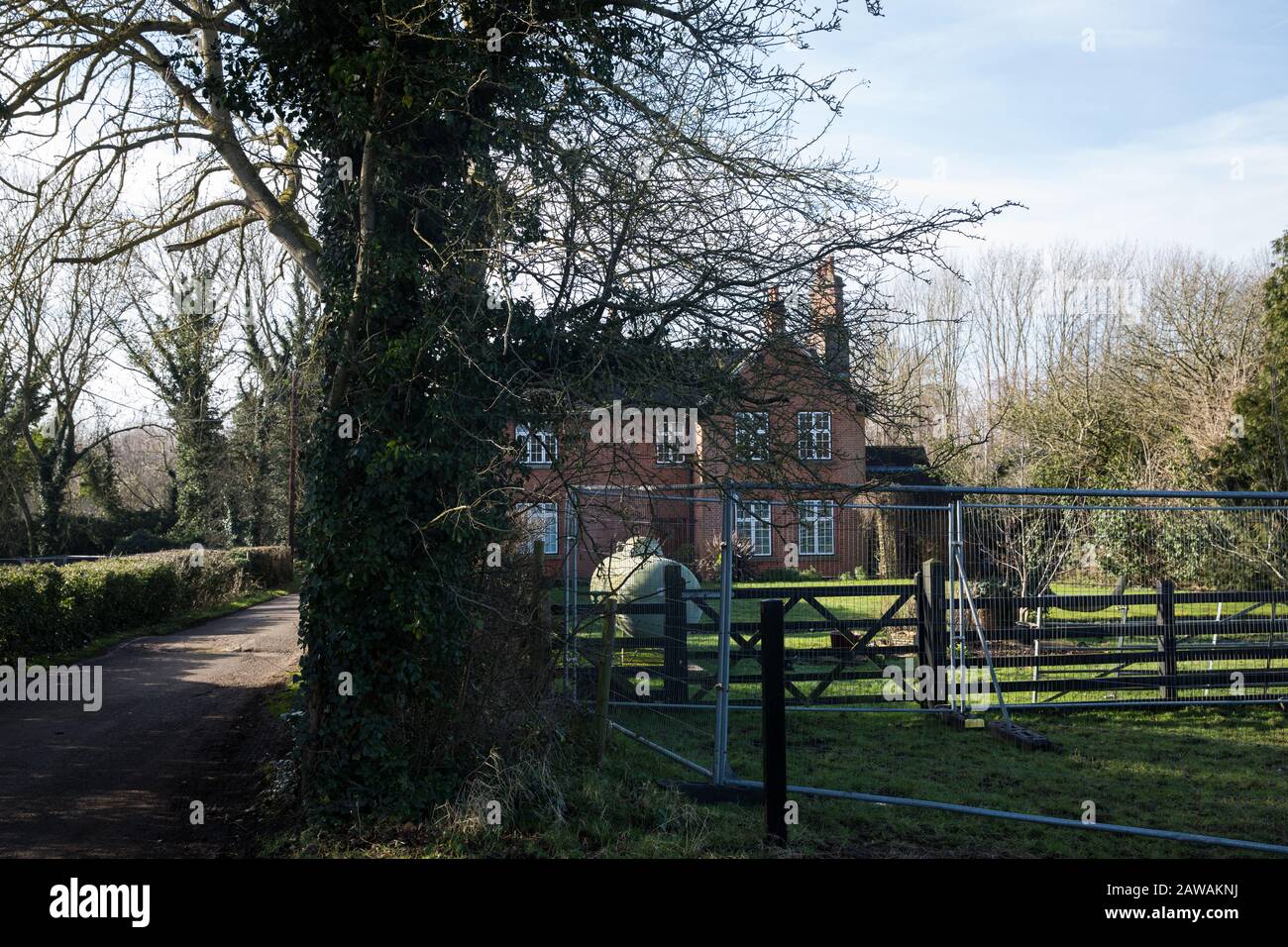 Harefield, UK. 7 February, 2020. HS2 fencing alongside Dews Farm. The ...