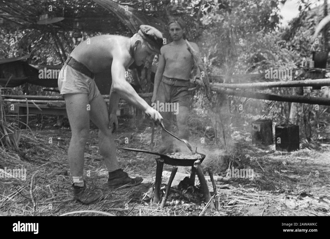 Report Hollandia Soldiers in a camp in the jungle Date: February 1947 ...