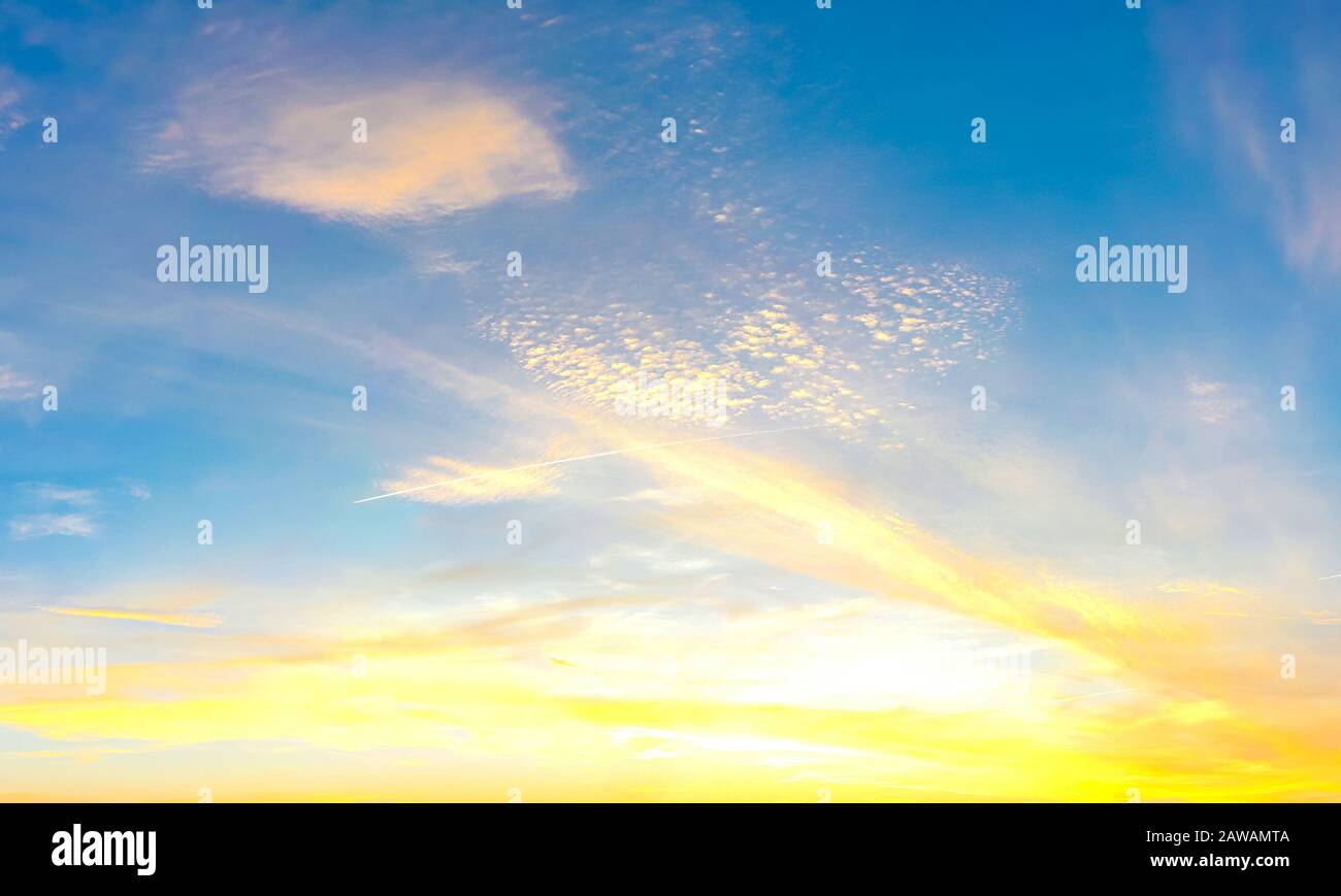 Beautiful sunrise panorama with cloud formations in orange and yellow ...