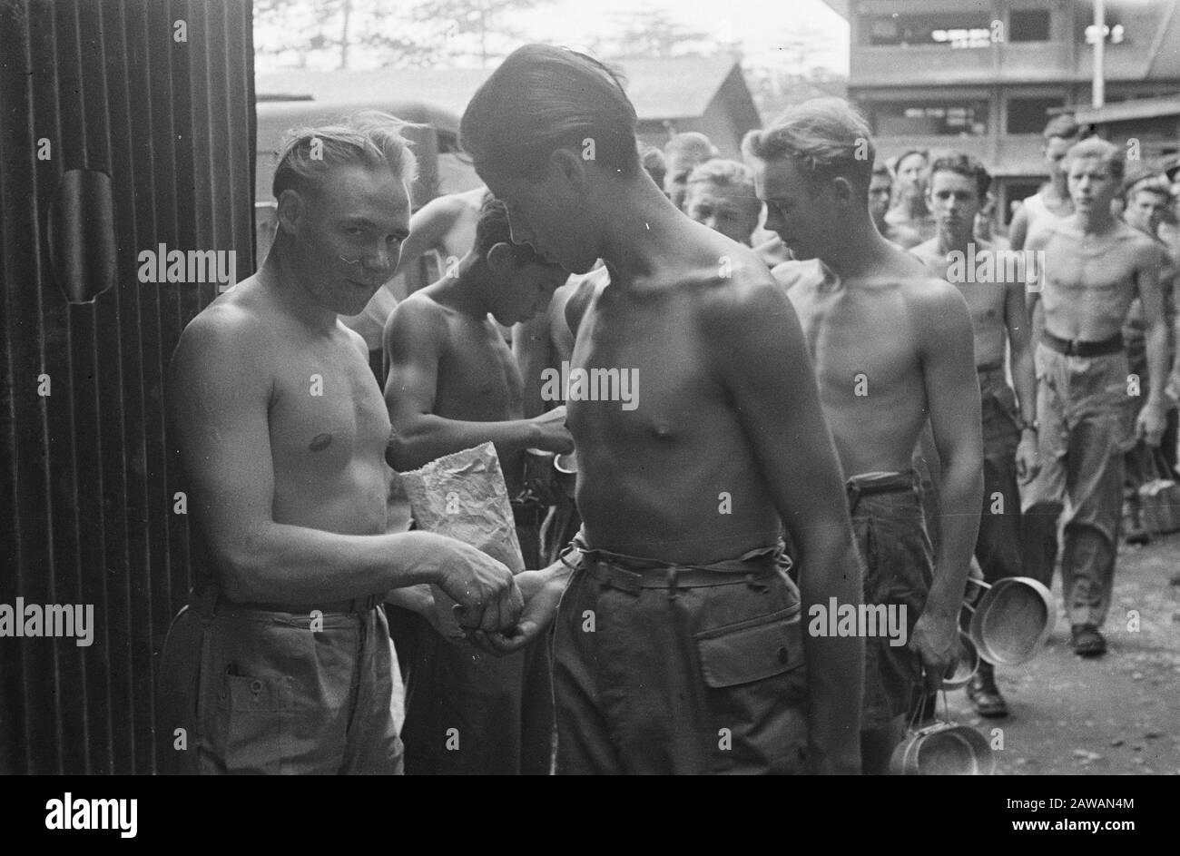 Report Semarang and environment Soldiers with their messtins queue Date ...