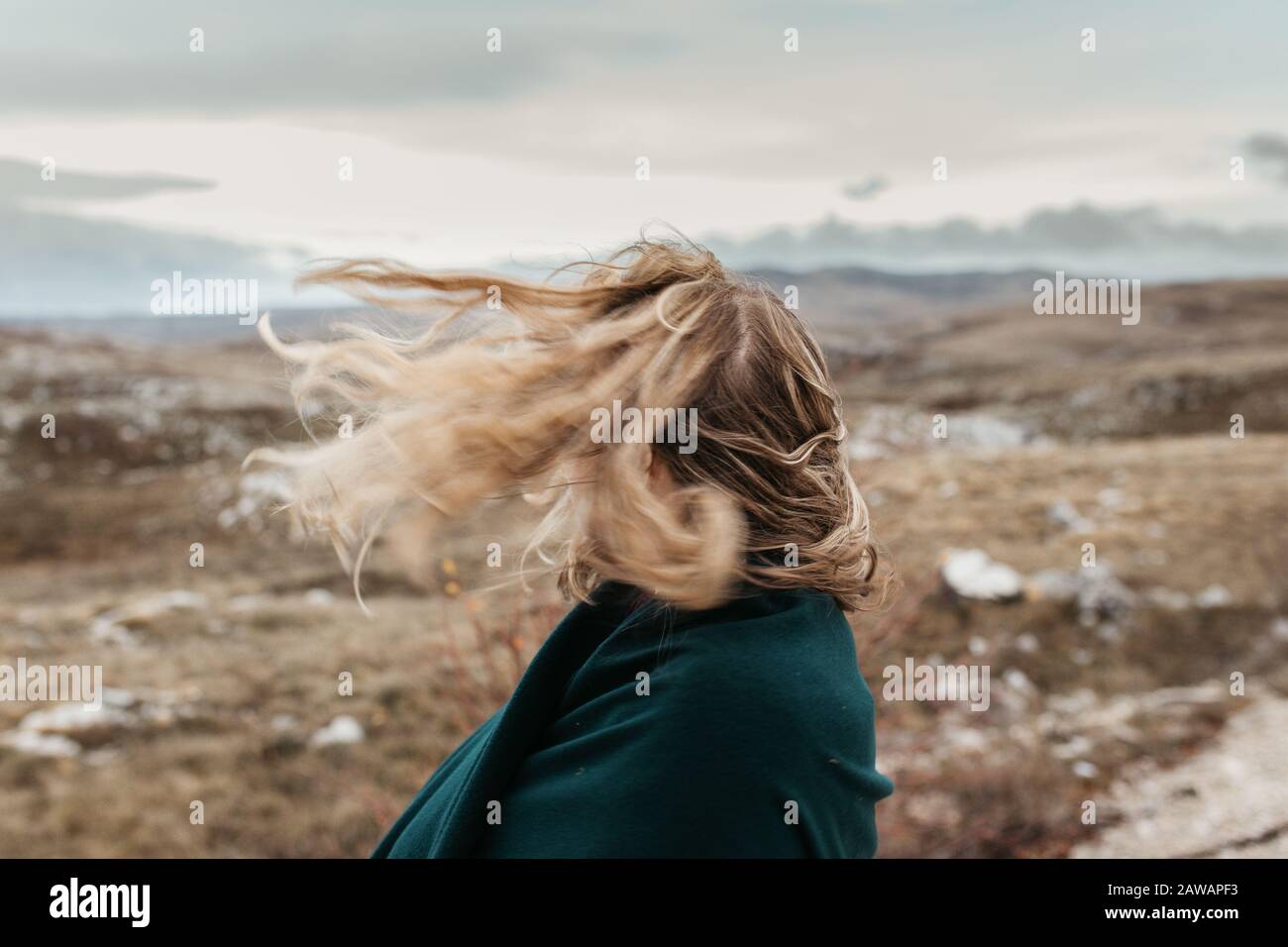 Strong wind blowing woman hi-res stock photography and images - Alamy