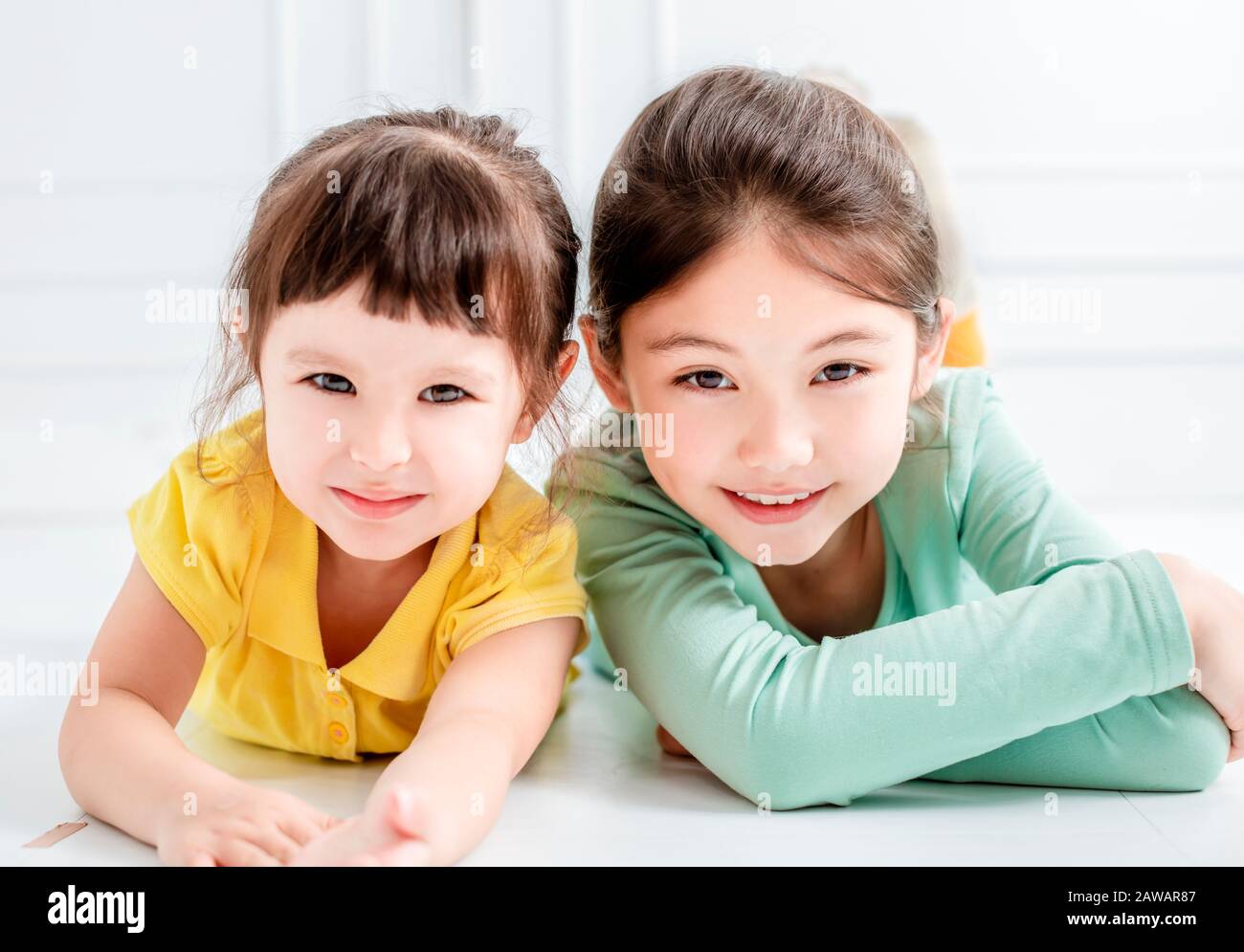 closeup Two little girls face together Stock Photo - Alamy