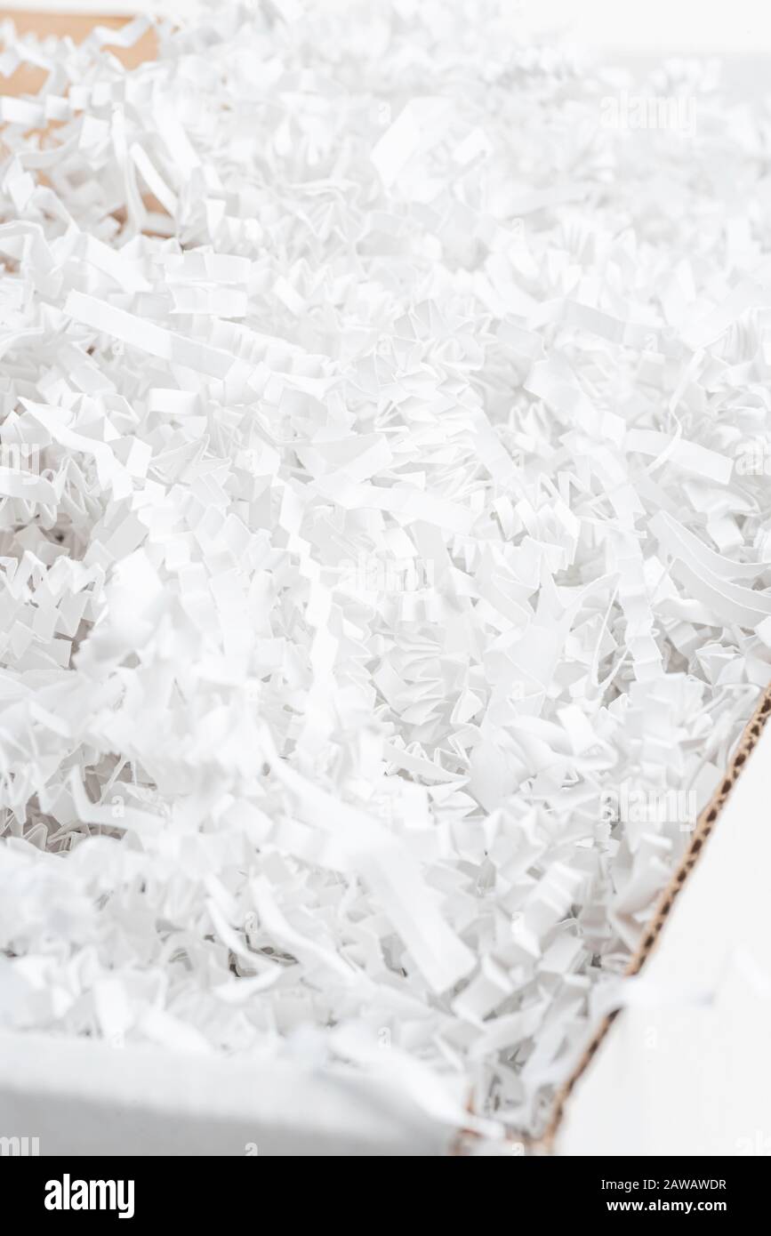 A close-up studio shot of a generic open white packaging box set on a ...