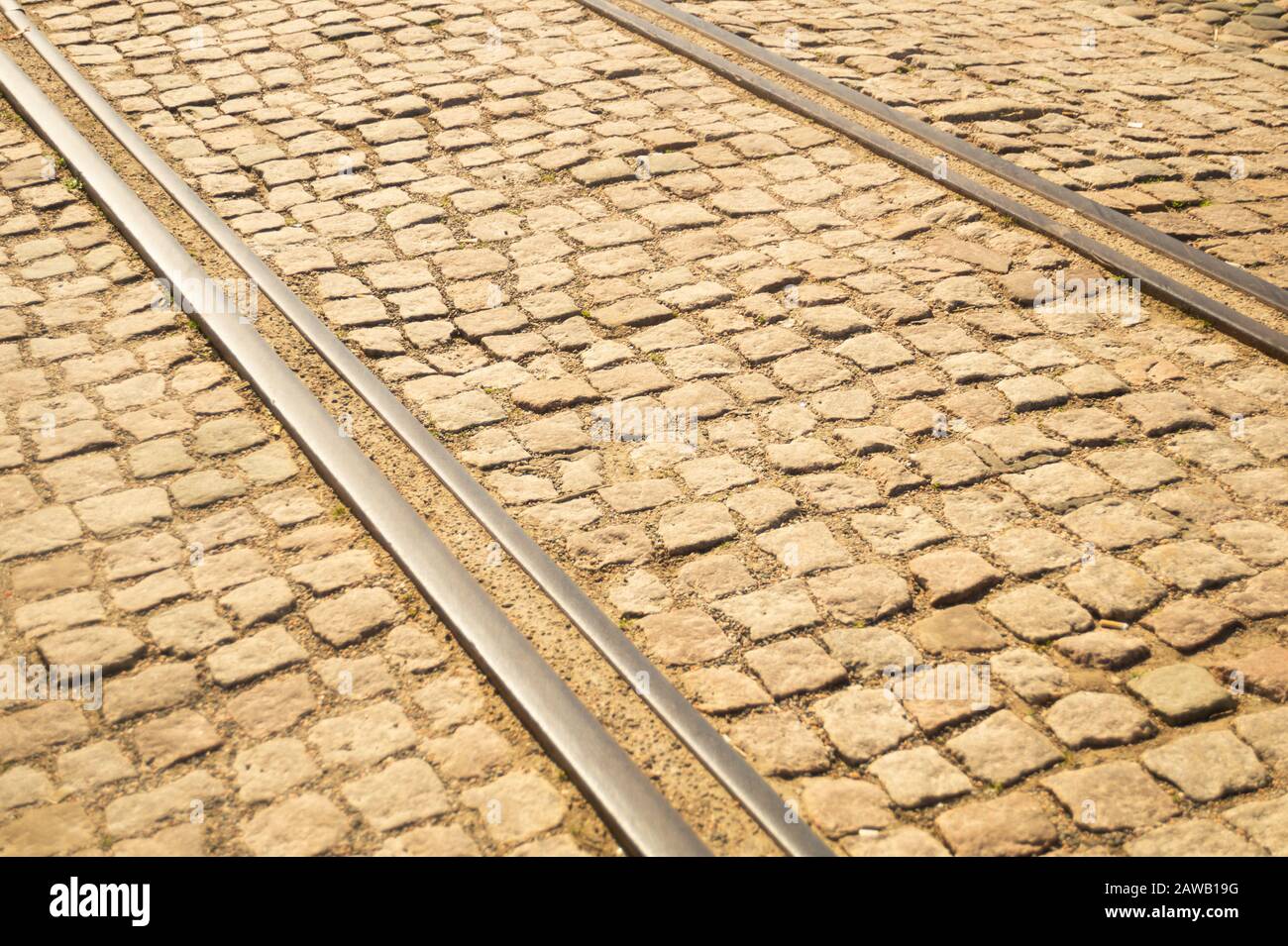 Brick texture. tram rails on stone pavement background Stock Photo - Alamy