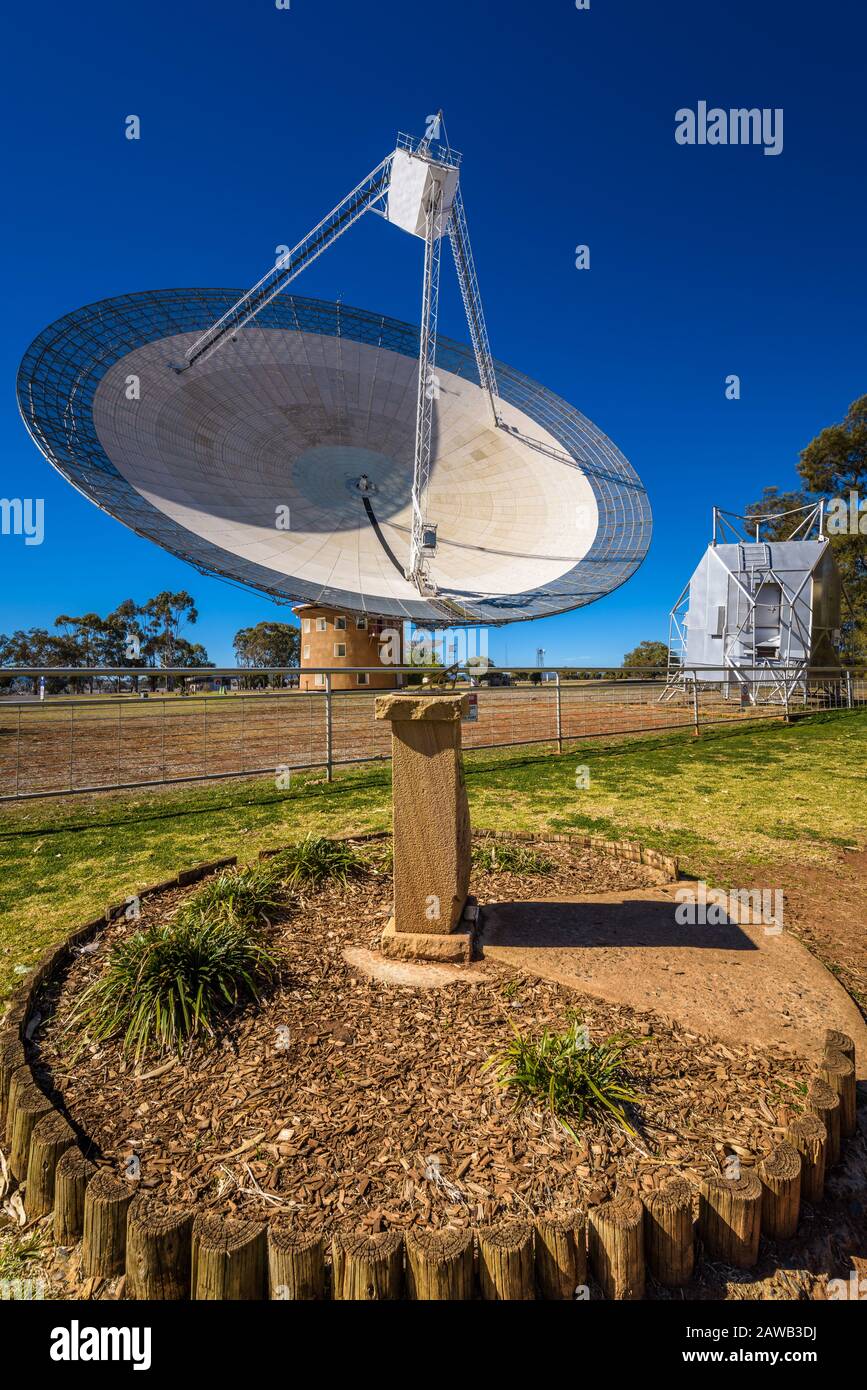 Circular garden with a static compass marker pillar and model satellite ...