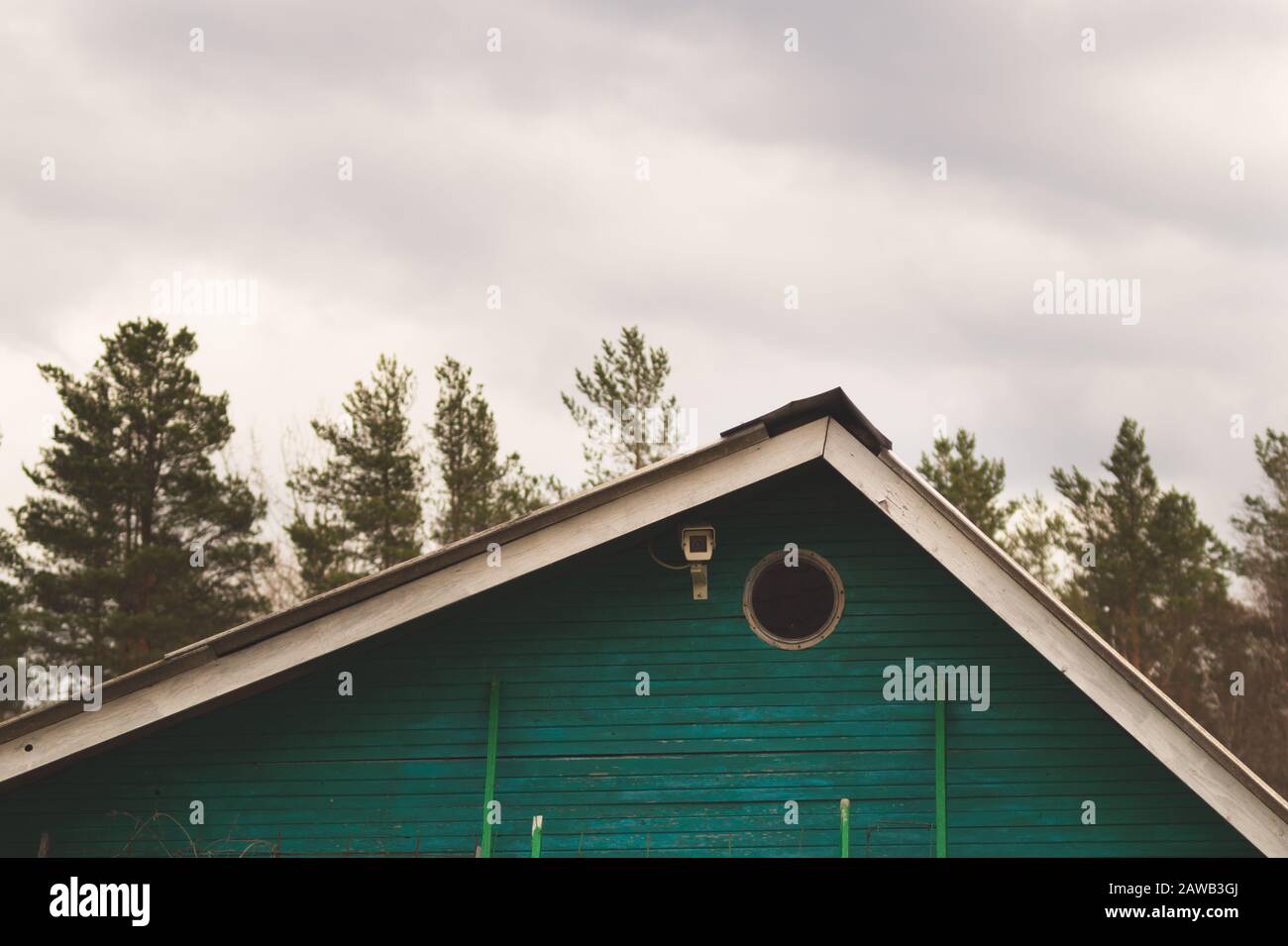 Green roof of rural house with surveillance camera background Stock ...