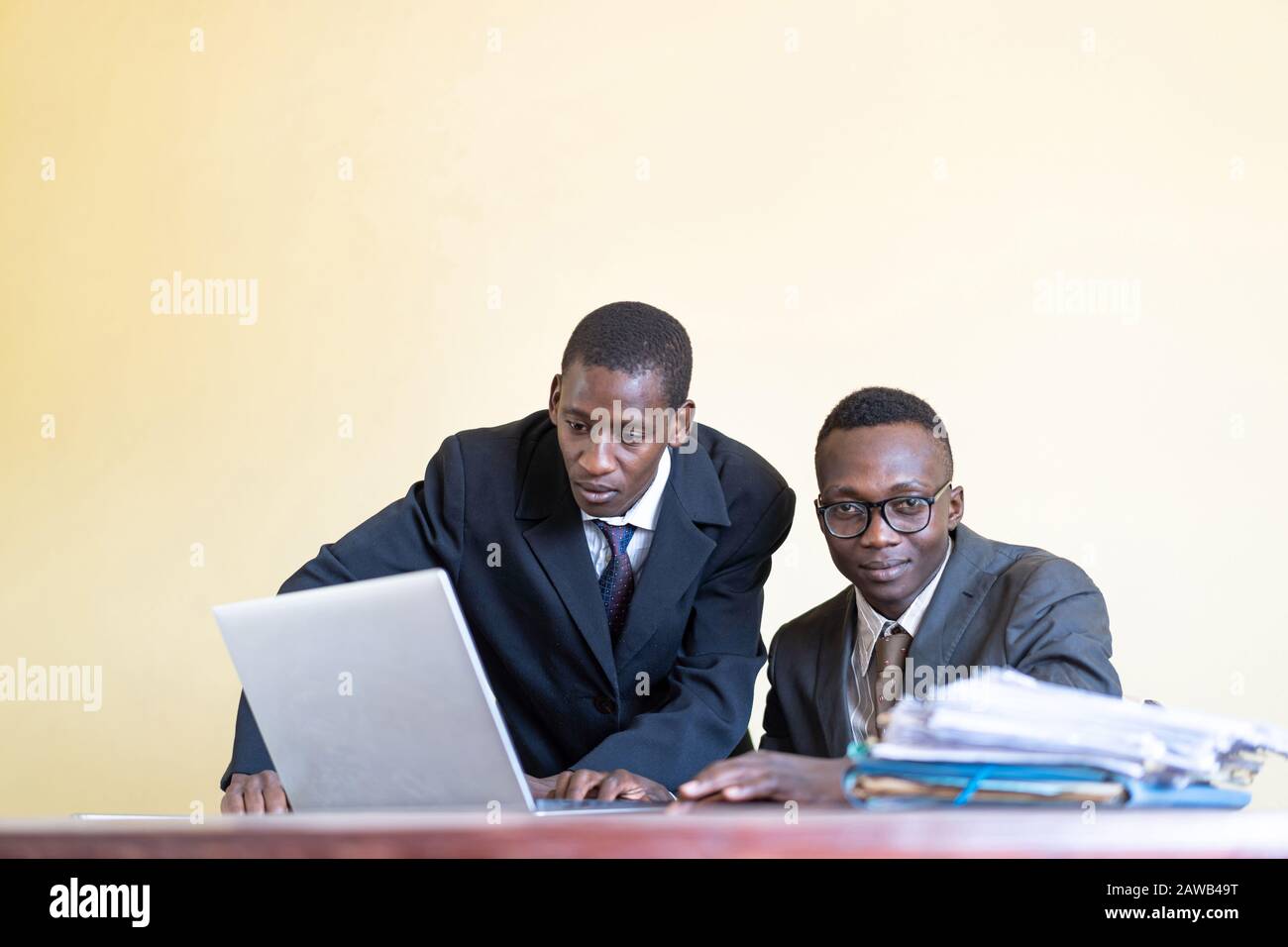 Photograph of working men at work celebrating at the workplace Stock ...