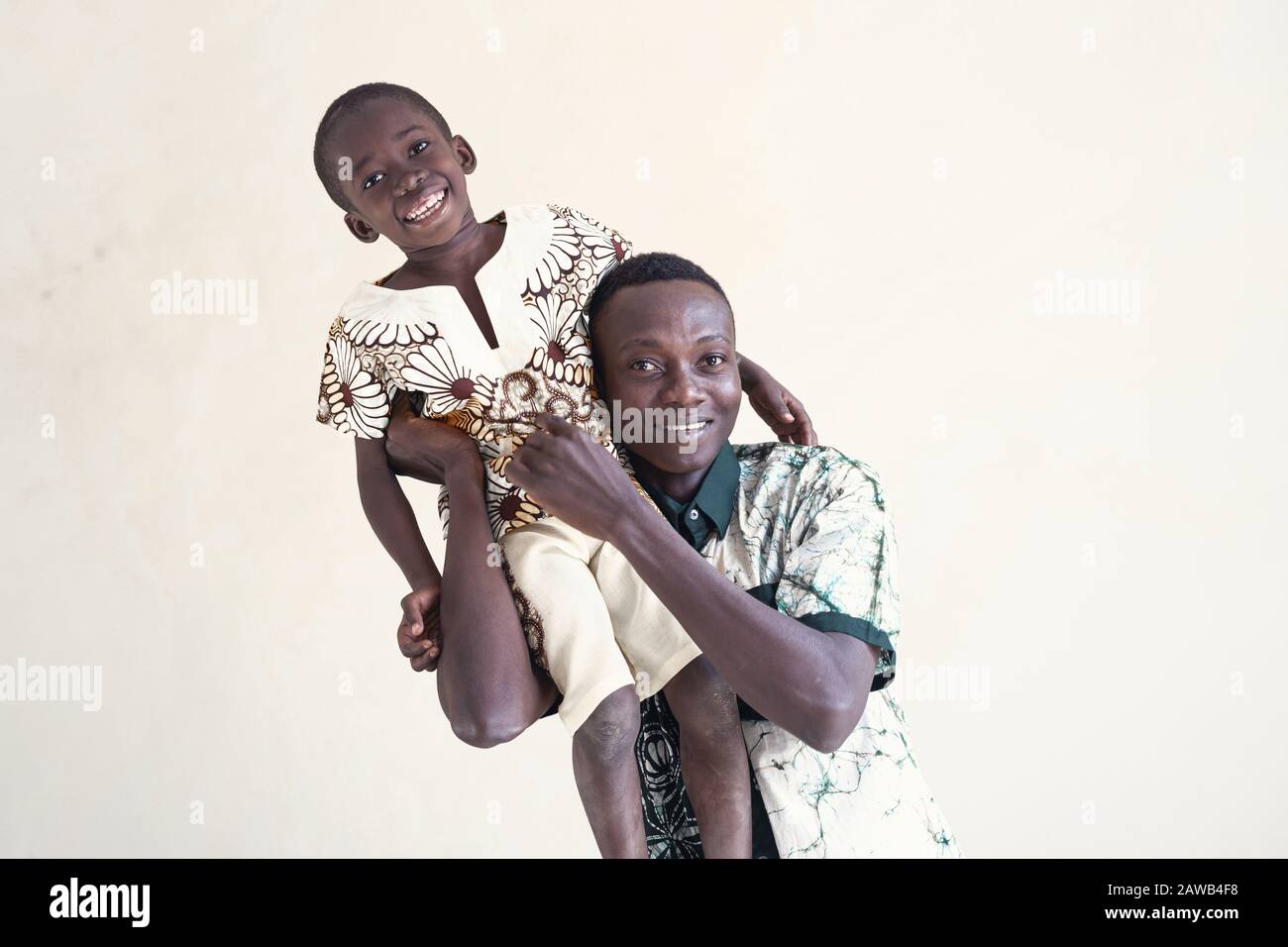 African ethnicity family with dad and son cheerful photo smiling and ...