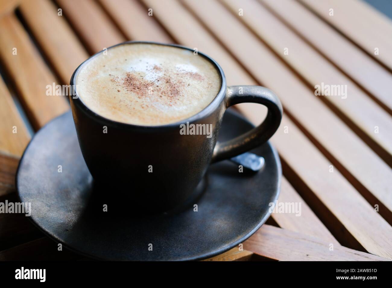 hot cappuccino latte mocha coffee on wood table. delicious beverage ...