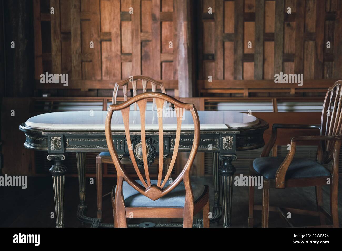 old vintage retro wooden chair & working table in home office interior ...