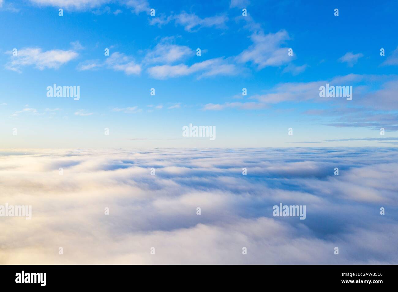 Aerial view White clouds in blue sky. Top view. View from drone. Aerial bird's eye view. Aerial ...