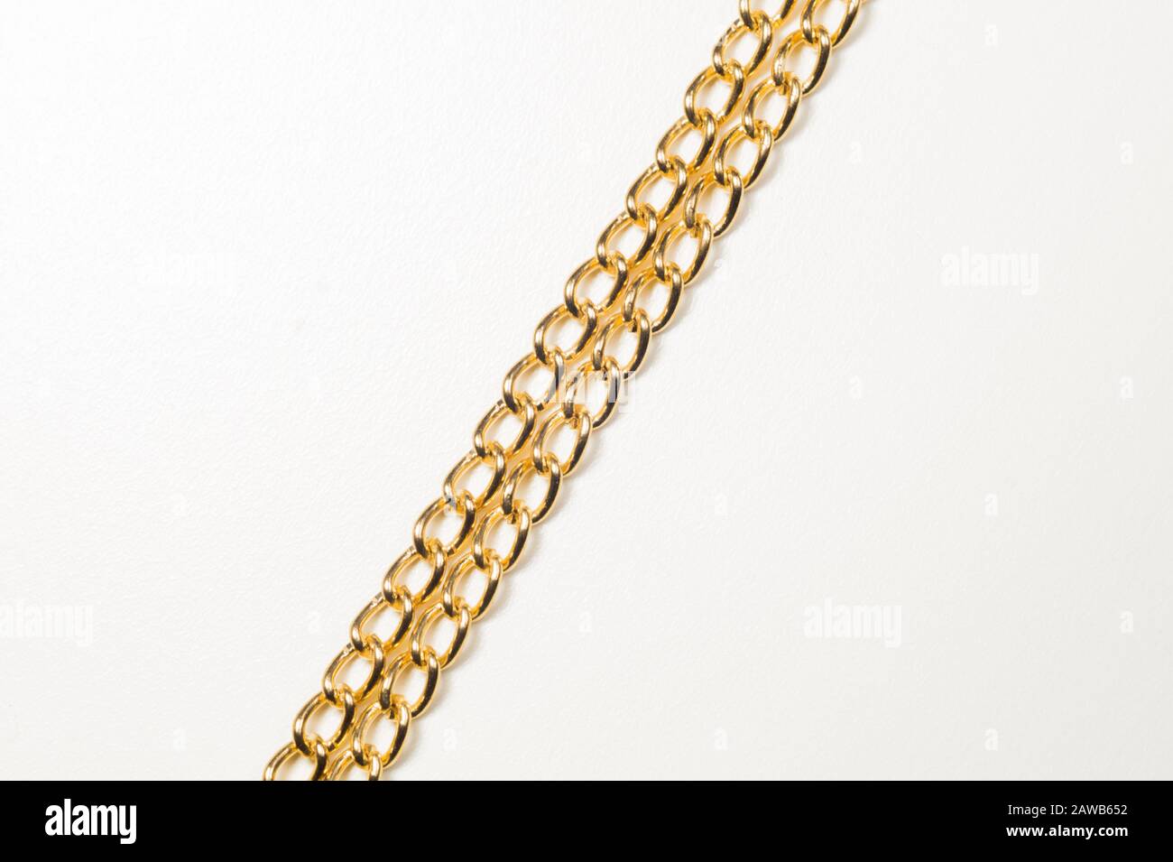 Gold chain link bracelet hi-res stock photography and images - Alamy