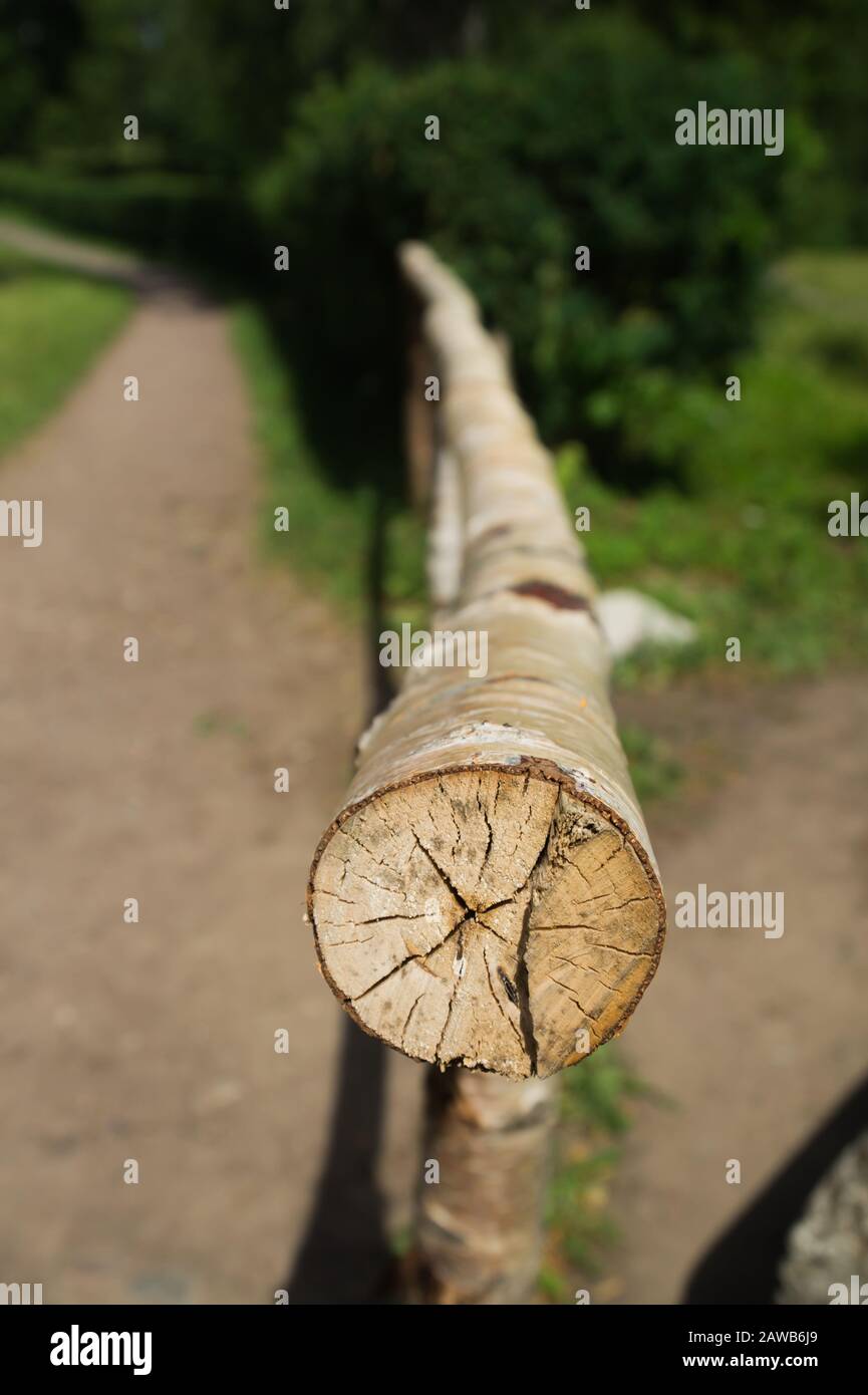 Wooden log fence. handrails from wood. rural scene Stock Photo - Alamy