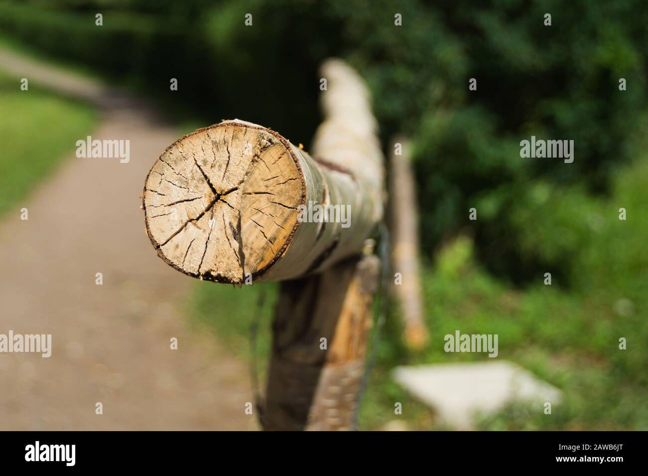 Wooden log fence. handrails from wood. rural scene Stock Photo - Alamy