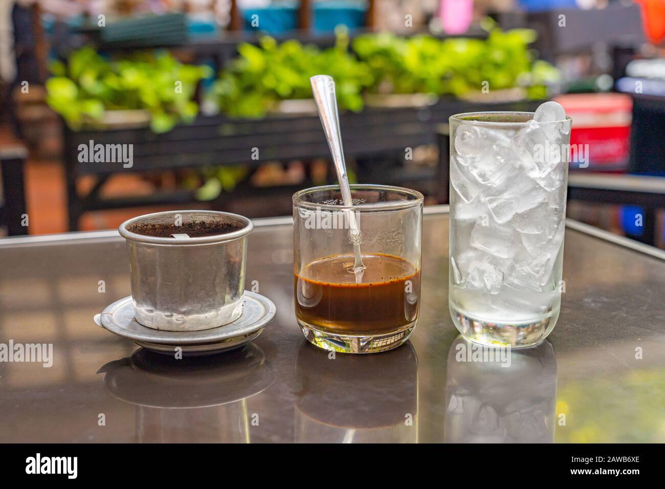 Vietnam fin coffee mixed with condensed milk- Cafe sua da Stock Photo ...