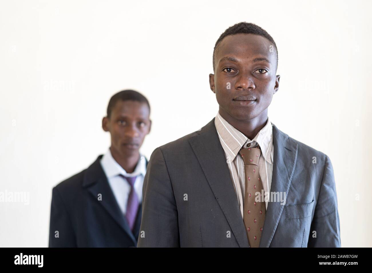 African ethnicity jobbing Business men at work looking seriously ...