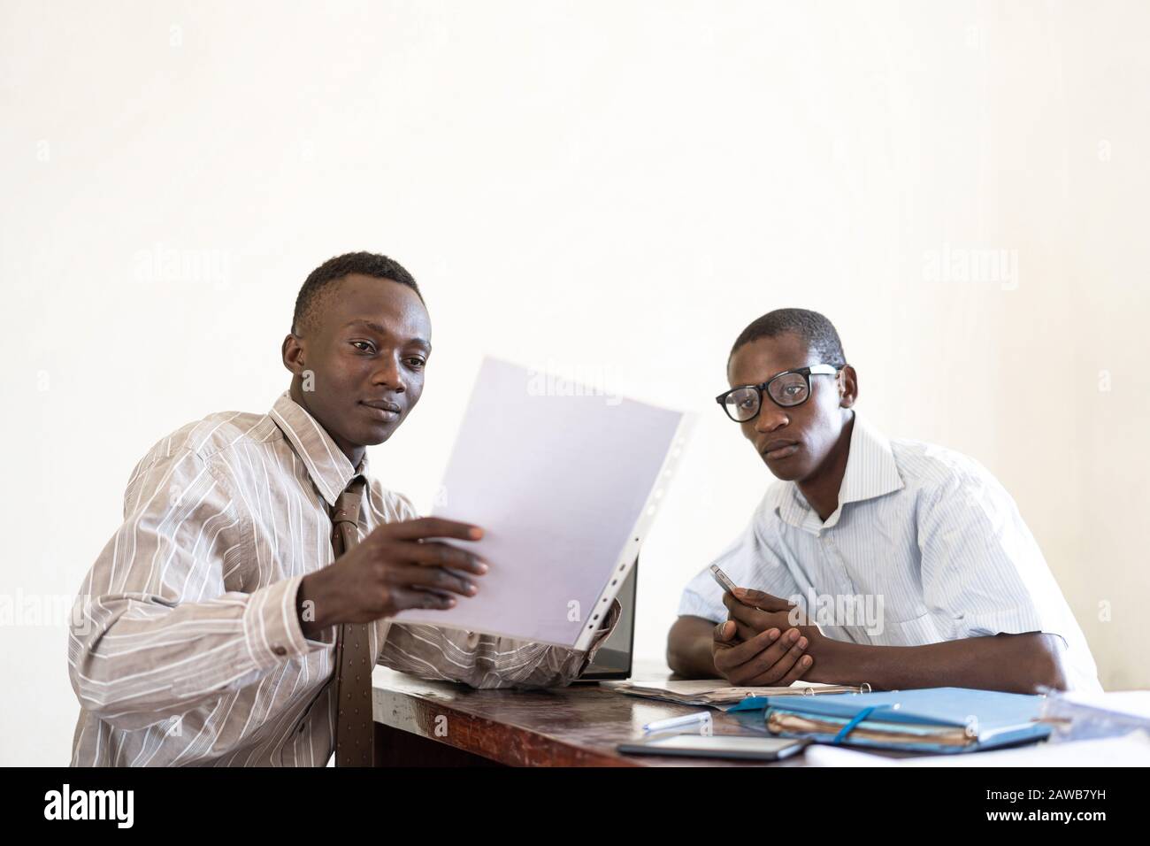 Two Black Business People Talking