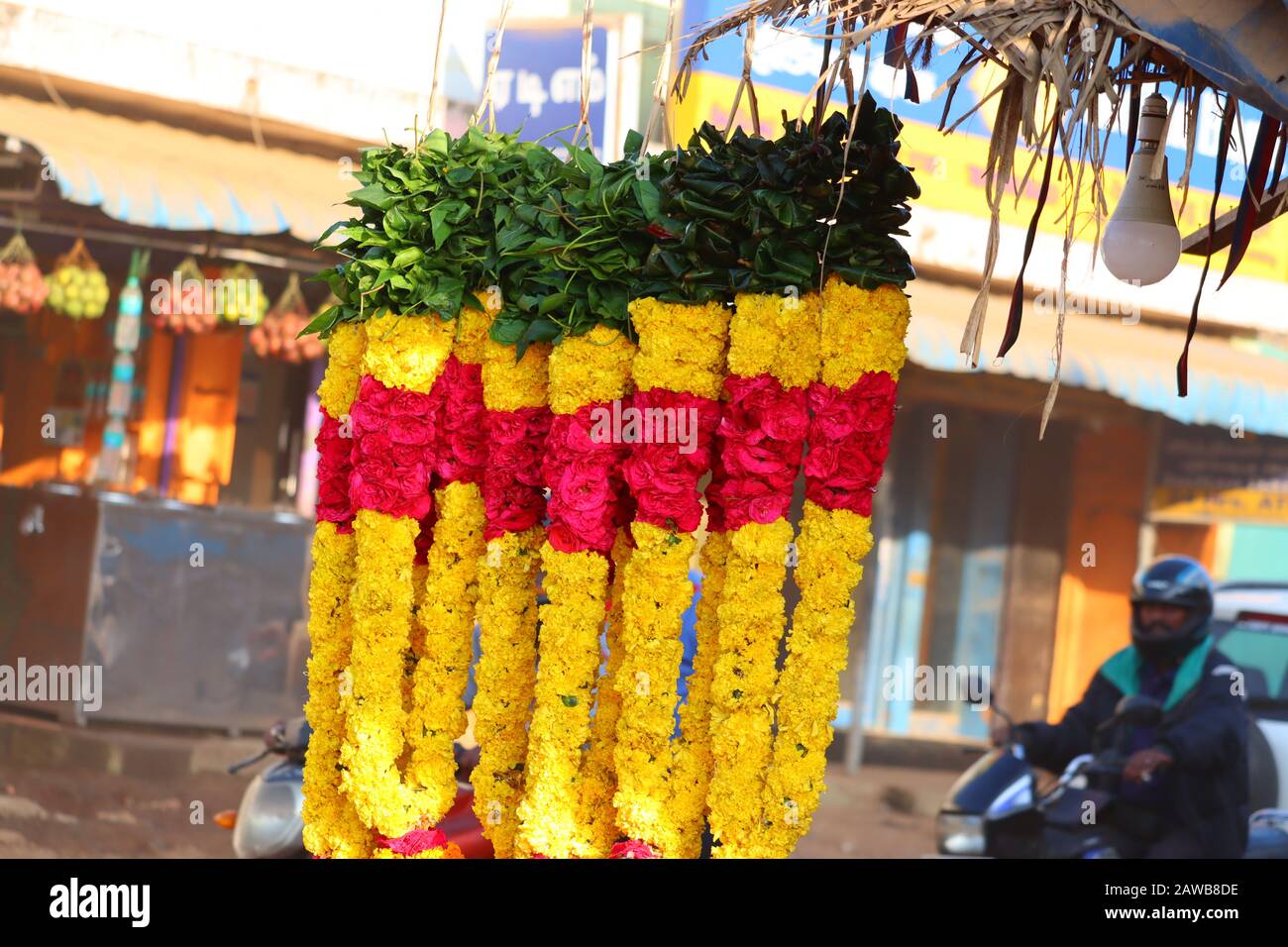 close- up of red roses flowers, yellow marigolds flowers, green leaves ...