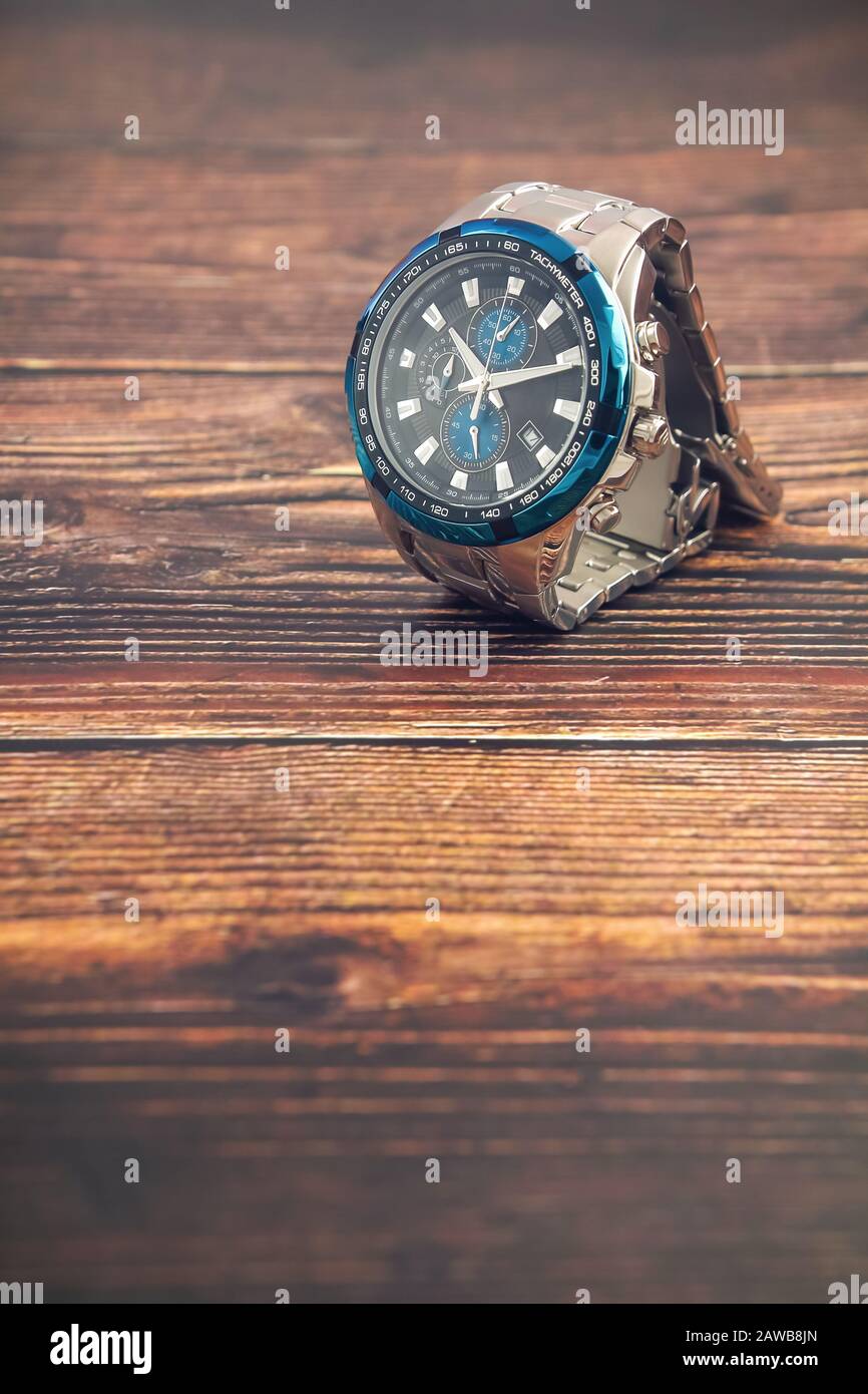Mens watch wooden table hi-res stock photography and images - Alamy